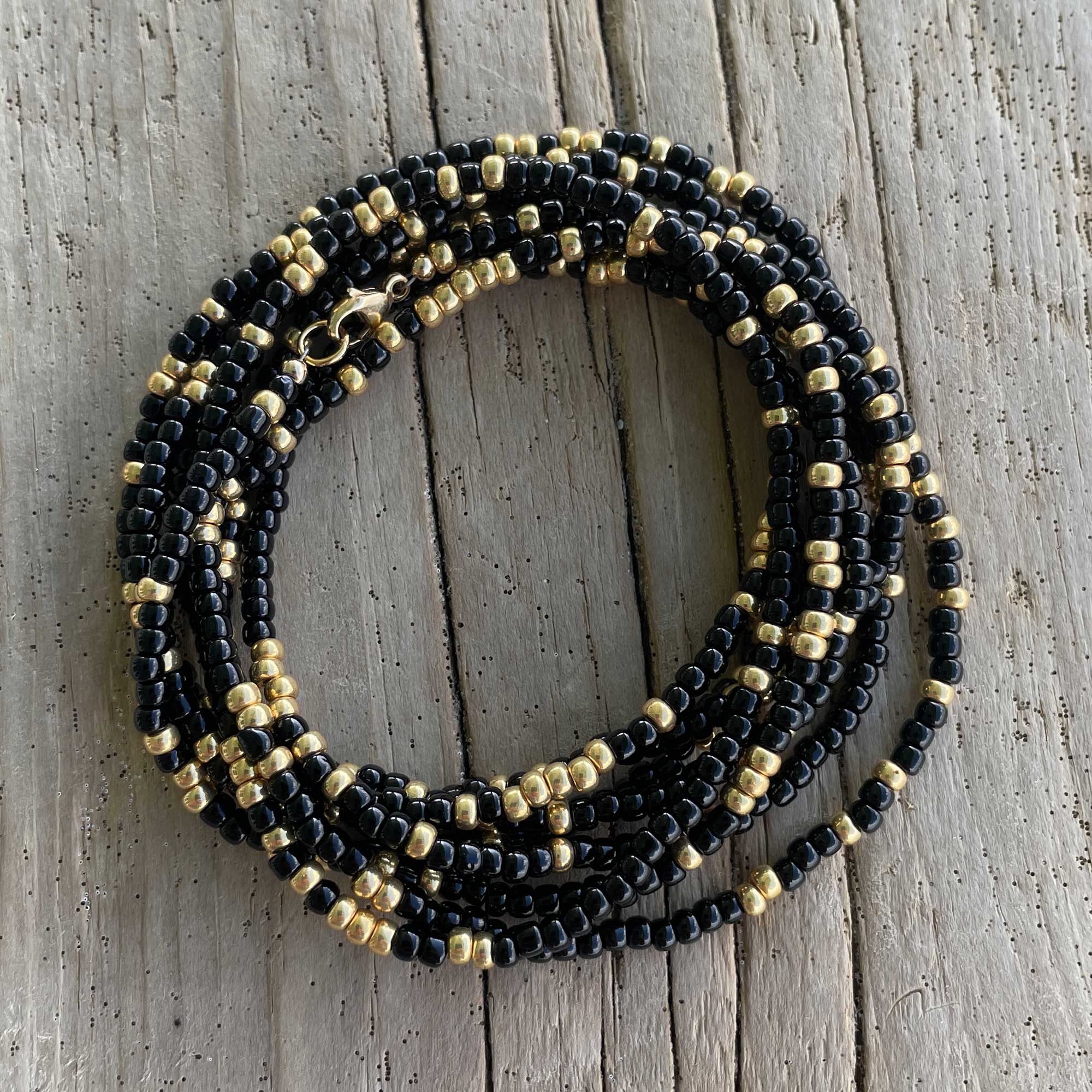 Black beads gold necklace store